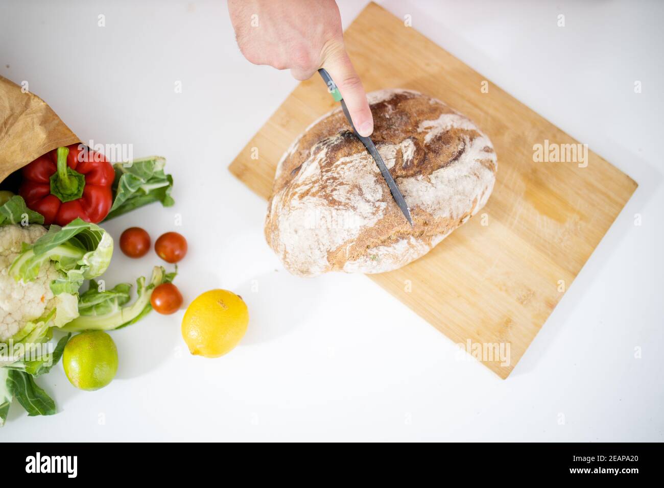Top view male hands cutting hi-res stock photography and images - Alamy