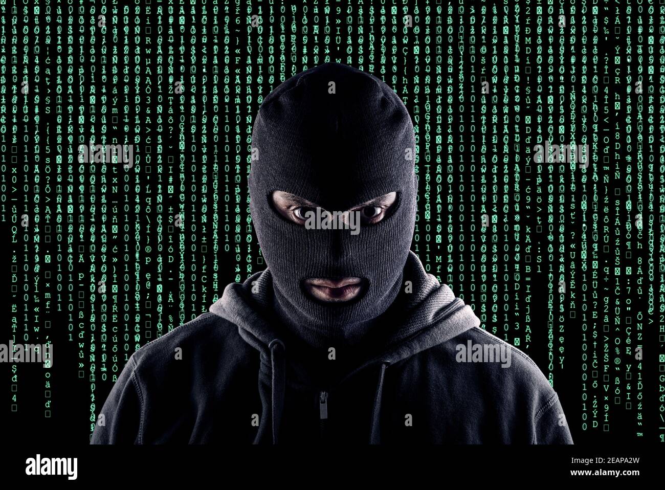 Anonymous hacker in black hoodie hi-res stock photography and images ...