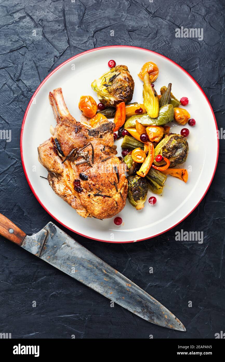 Roasted rack of pork Stock Photo - Alamy