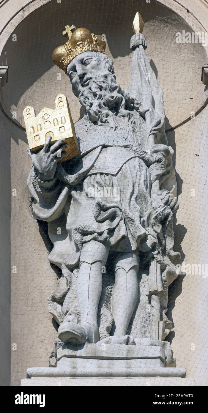 Statue of Saint on baroque Jesuits church in Vienna, Austria Stock ...
