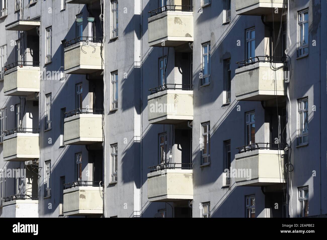 Urban regeneration. A 1950's concrete building is prepared for ...