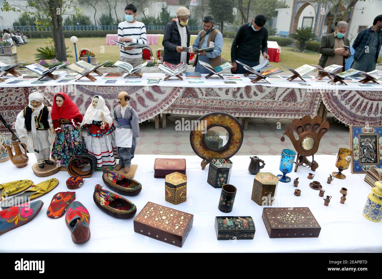 Visitors take keen interest at a stall during Iranian Cultural ...
