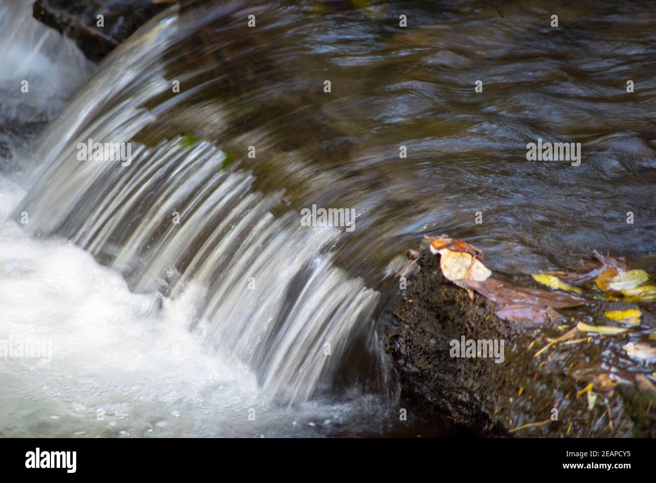 Spilling over rocks hi-res stock photography and images - Alamy