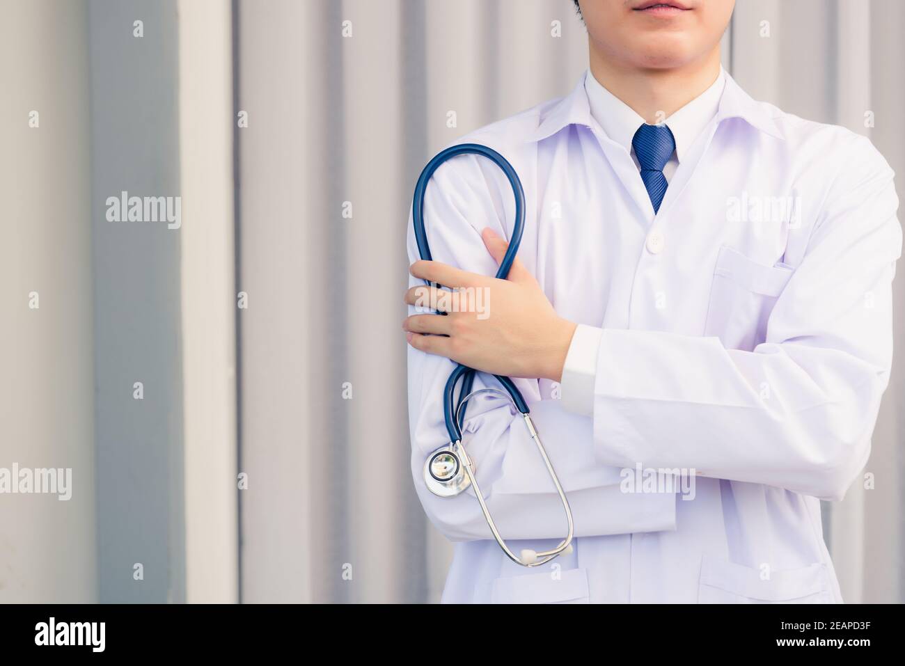Portrait doctor man smiling crossed arm hold stethoscope Stock Photo ...