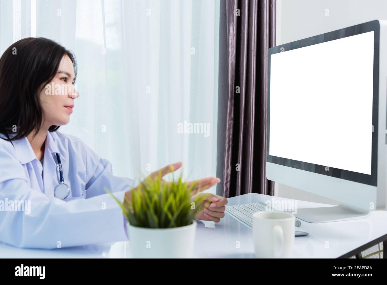 Woman doctor video call online raise hand to explain to patients Stock ...