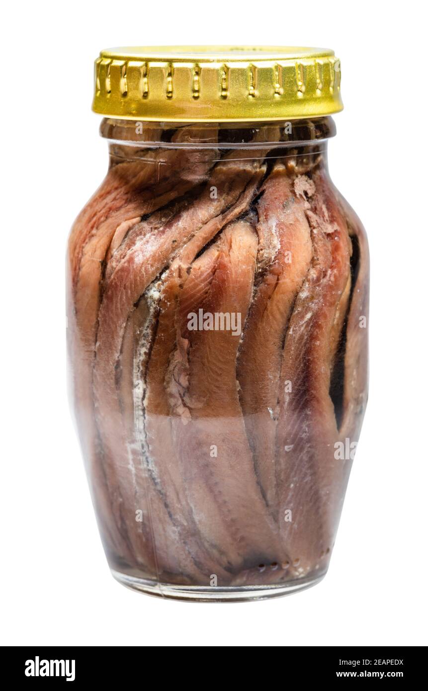 closed jar of canned anchovy fillets isolated Stock Photo - Alamy