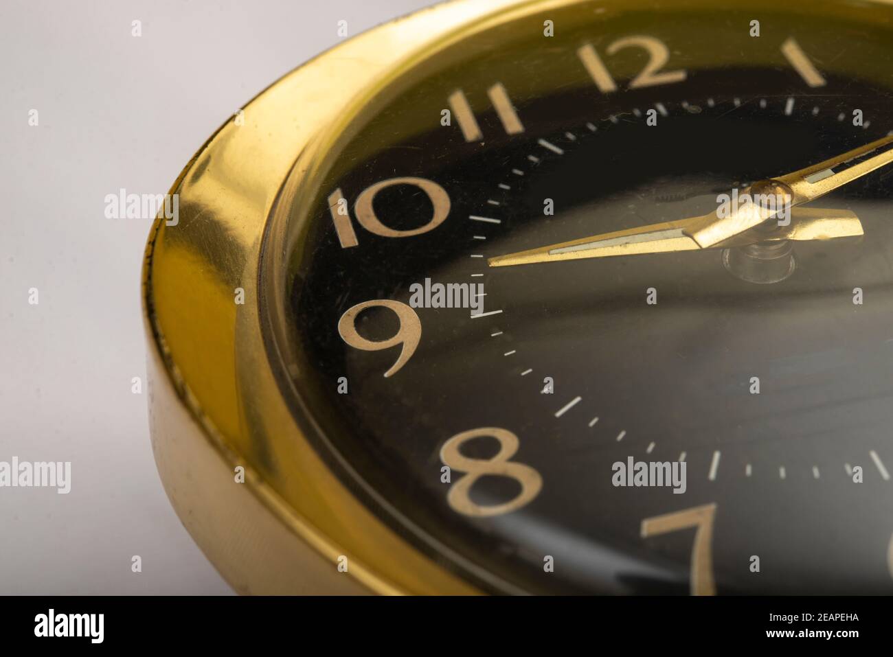 Golden clock closeup view - good morning concept Stock Photo - Alamy