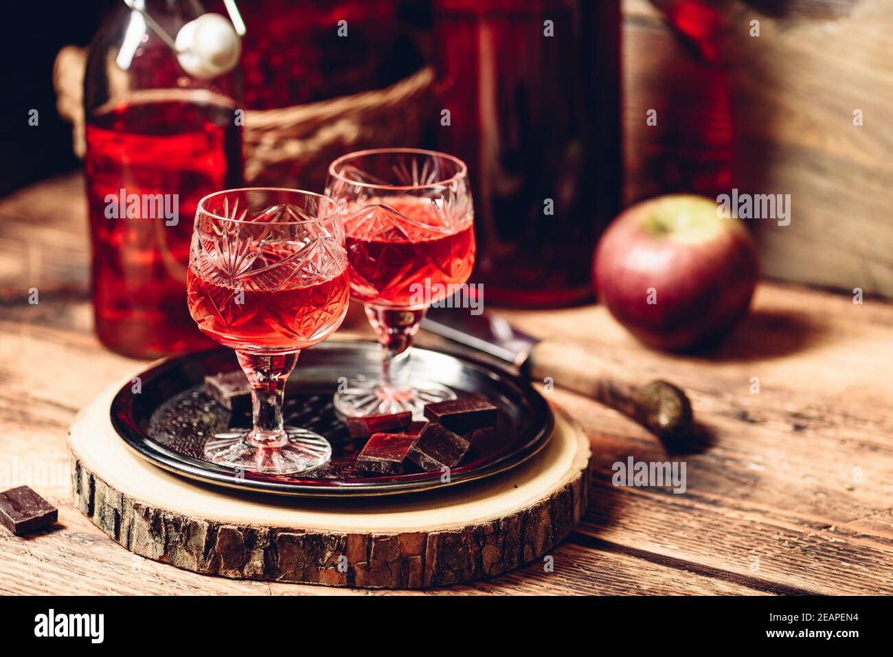 Homemade berry alcoholic beverage and chocolate Stock Photo - Alamy