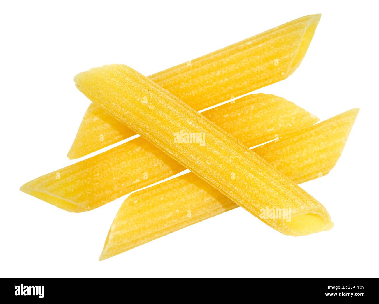 few dried Penne Rigate (italian pasta) isolated Stock Photo - Alamy
