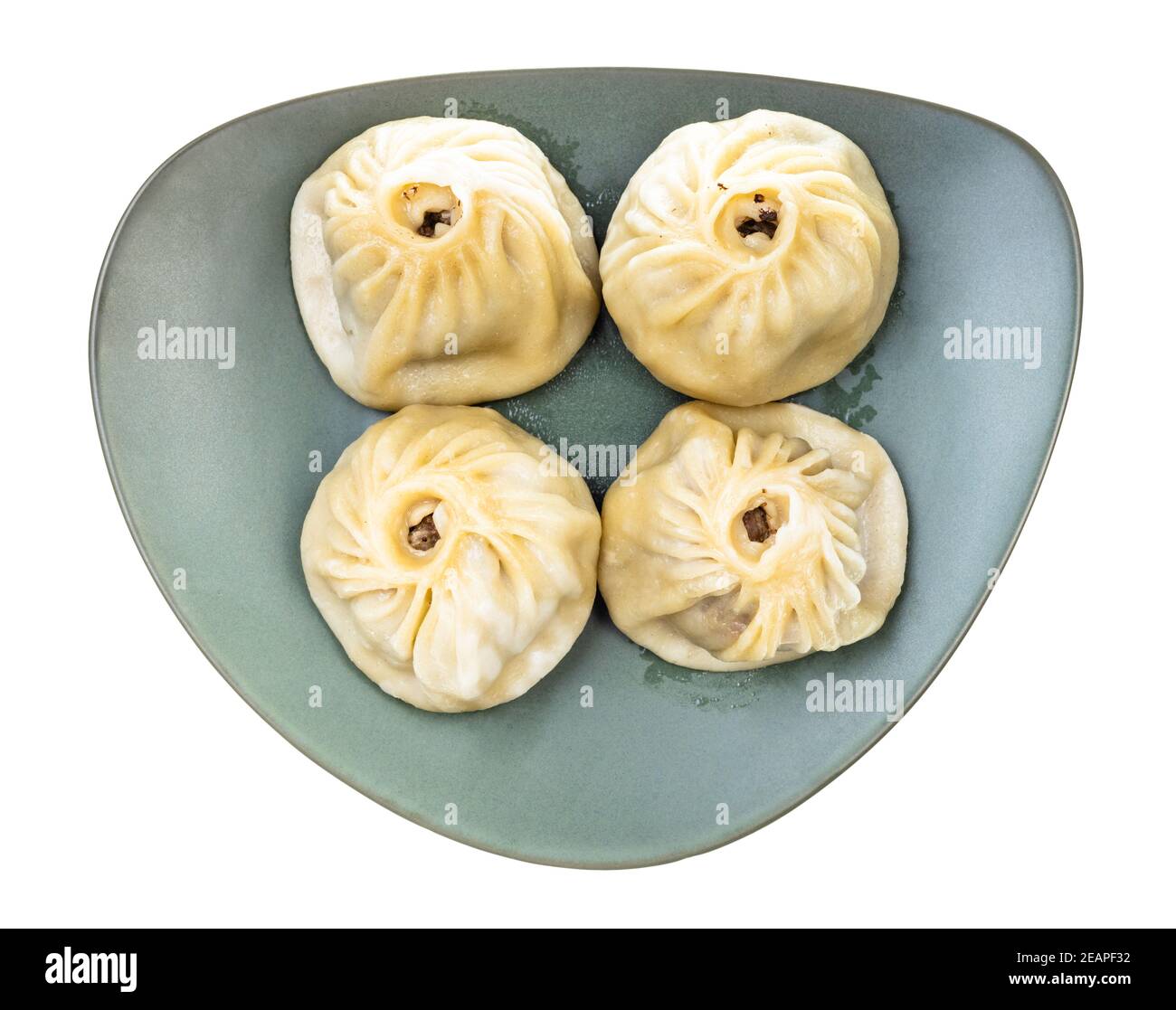 top view of steamed Buuz on green plate isolated Stock Photo - Alamy