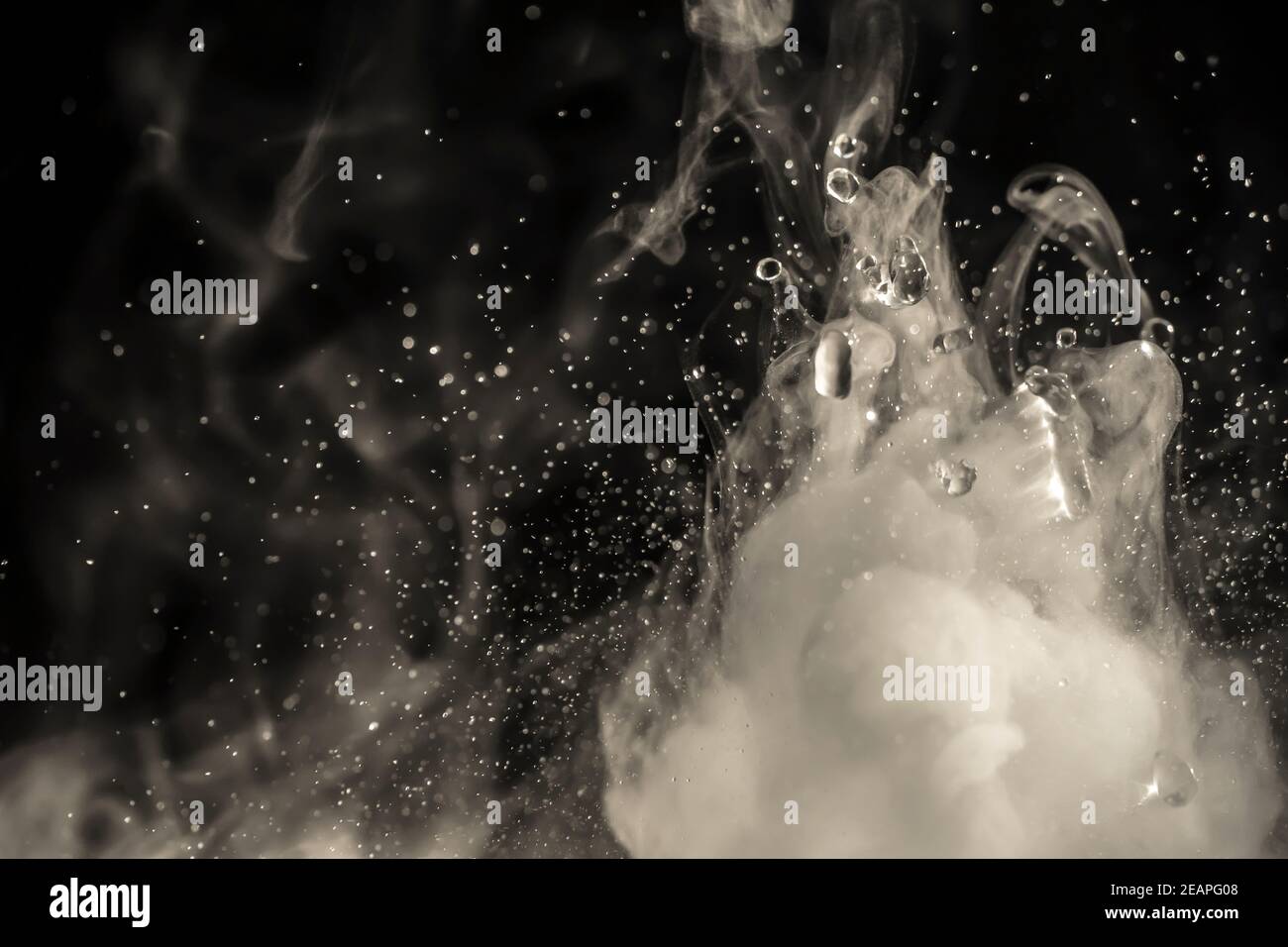 Water drop. Chemical reaction with boiling swirling water splashes ...