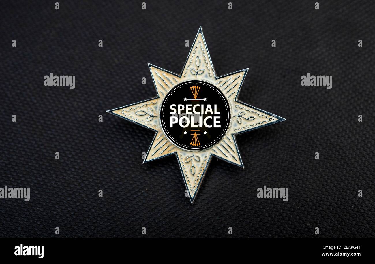 Special police badge with space close up view Stock Photo - Alamy