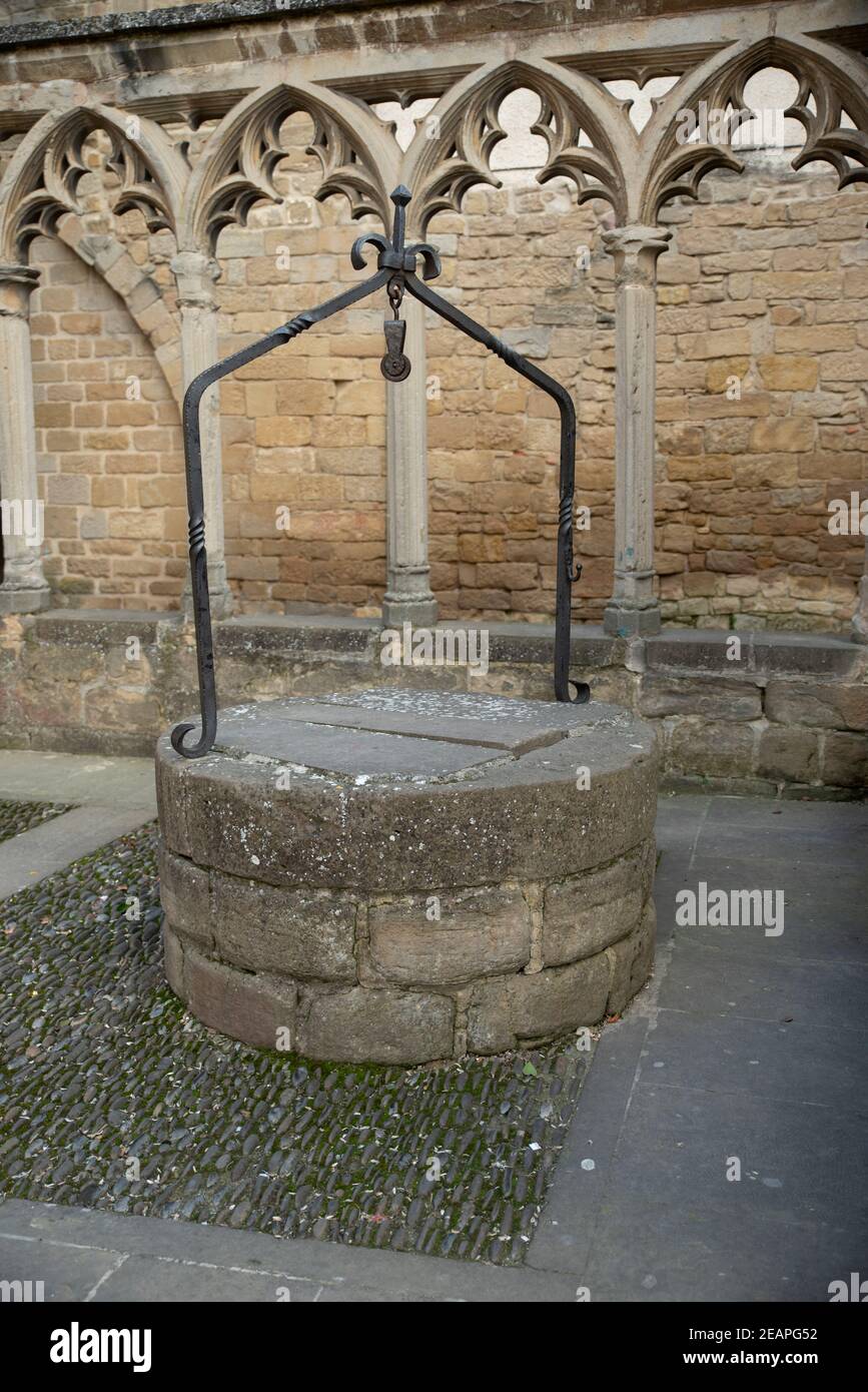 medieval well in the town square Stock Photo - Alamy