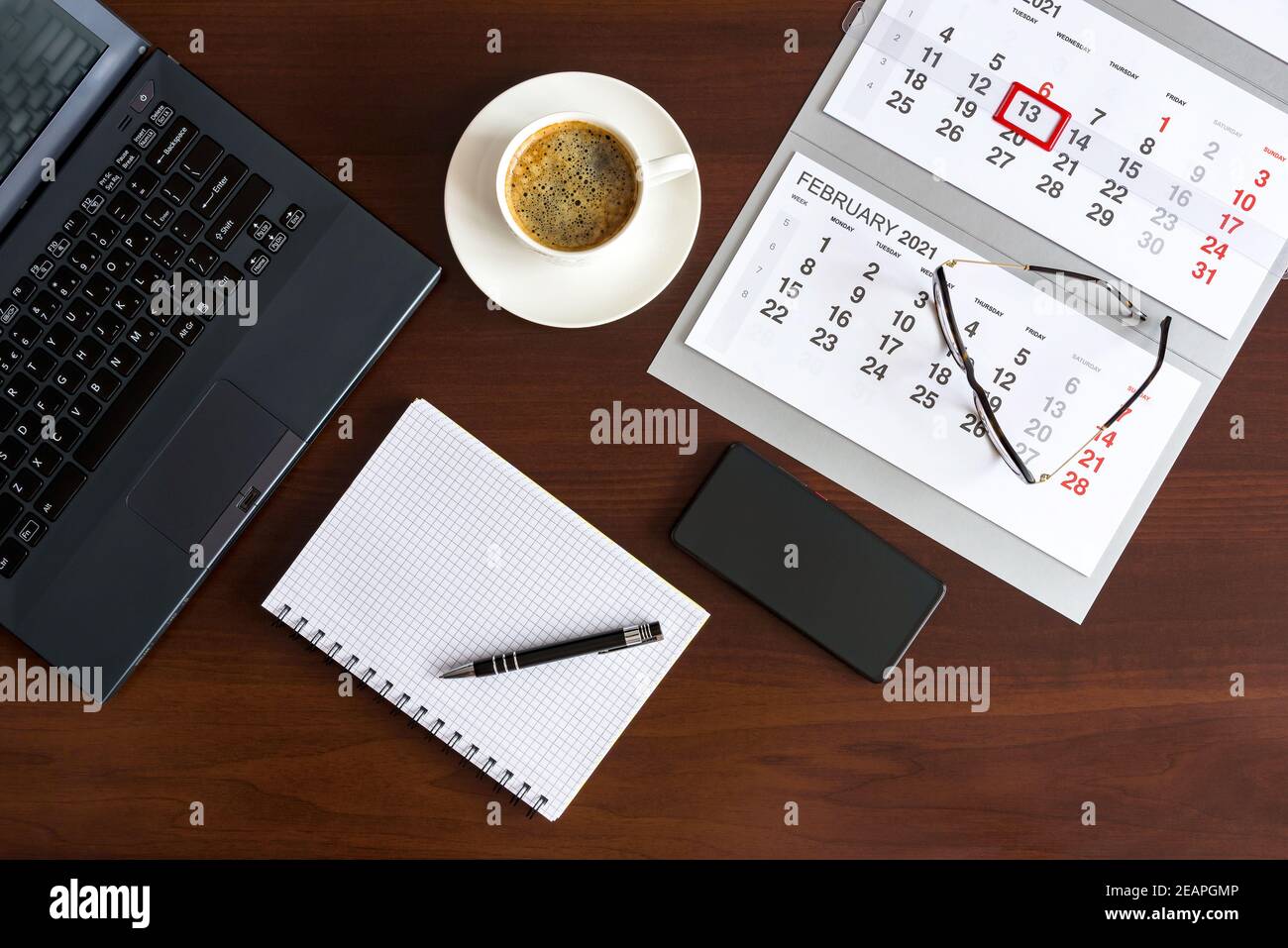Top view of wooden office desk table Stock Photo - Alamy