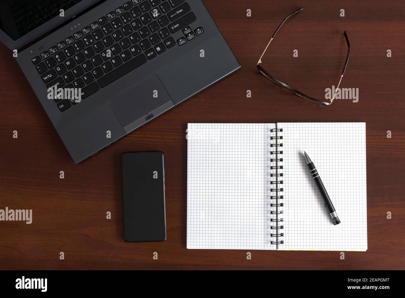 Top view of wooden office desk table Stock Photo - Alamy