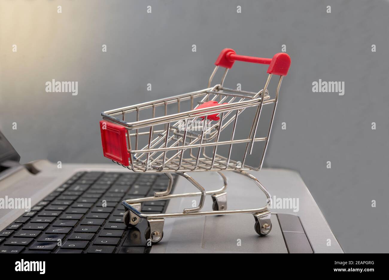 Shopping cart closeup on laptop keys - online store concept Stock Photo ...
