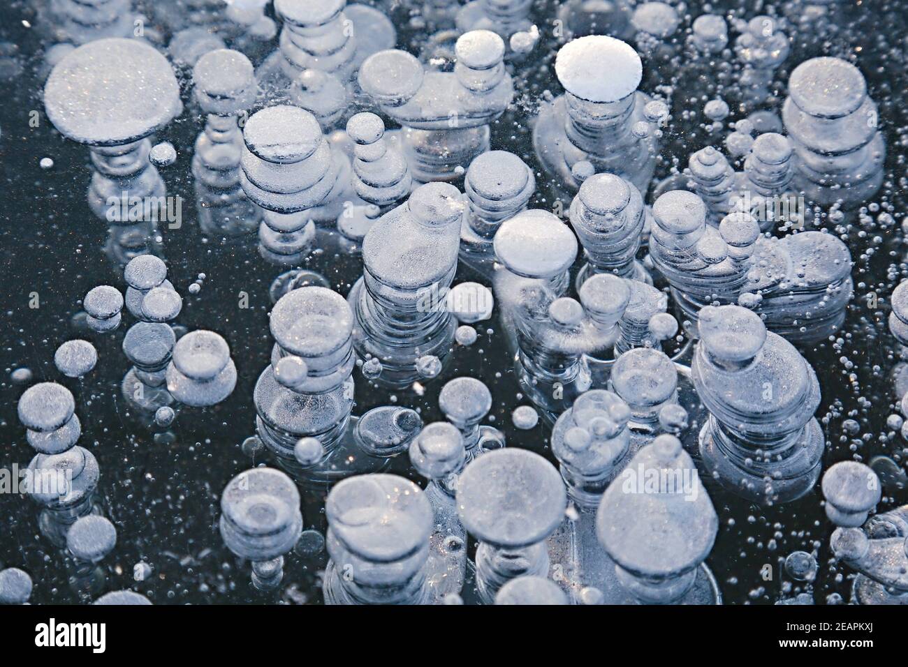 Winter ice with gas bubbles trapped inside Stock Photo - Alamy