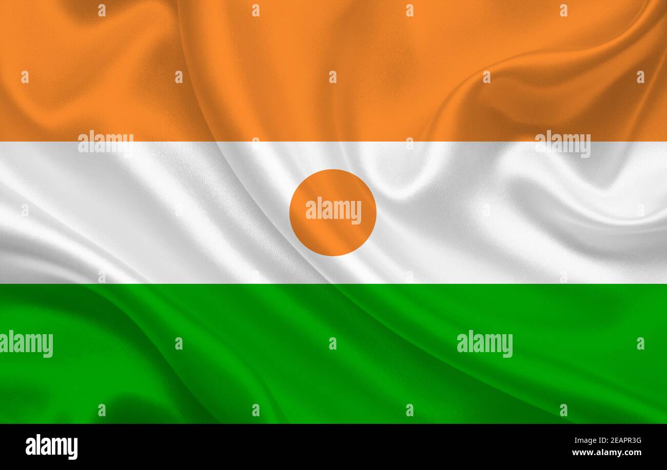 Niger country flag on wavy silk fabric background panorama Stock Photo ...