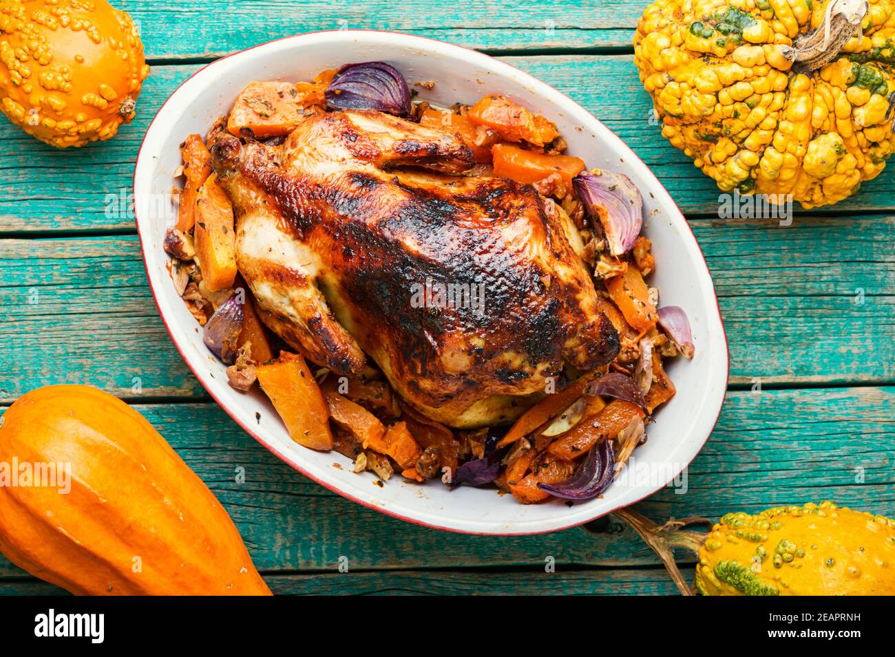 Baked partridge with pumpkin Stock Photo - Alamy