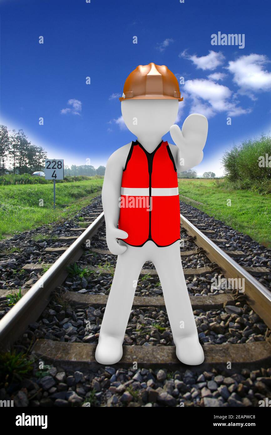 Little man stops the train on the railway Stock Photo - Alamy