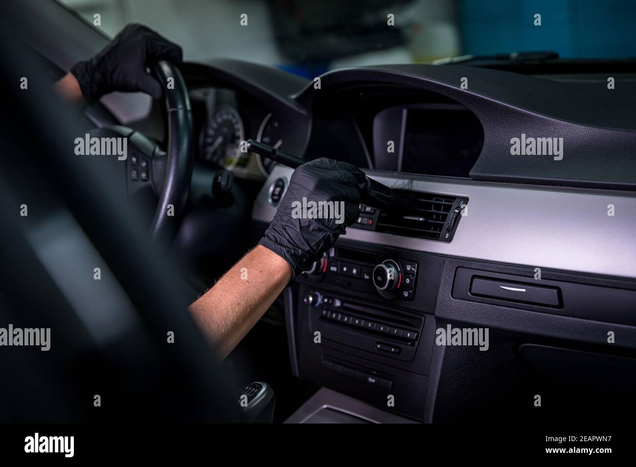 manual cleaning of the car interior with the help of brushing Stock ...
