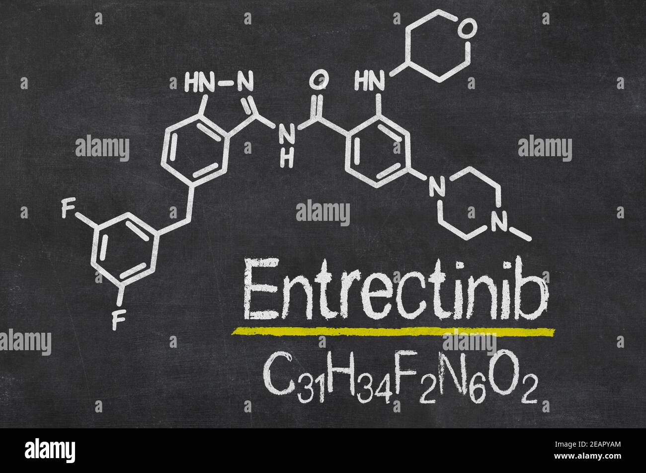 Blackboard with the chemical formula of Entrectinib Stock Photo - Alamy