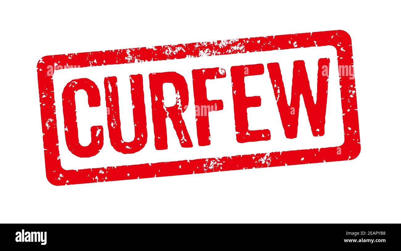 Red stamp on a white background - Curfew Stock Photo - Alamy
