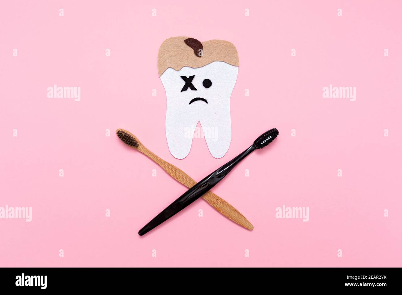 Crossed toothbrushes hi-res stock photography and images - Alamy