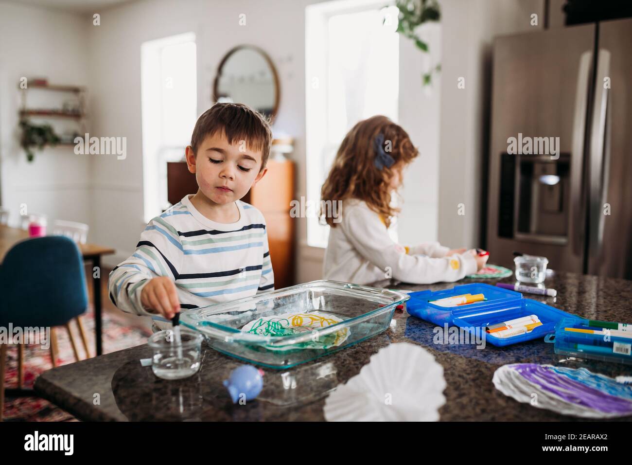 Happy kids doing arts and crafts hi-res stock photography and images ...