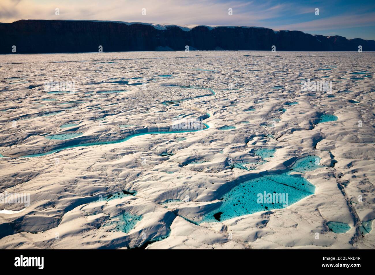 Aerial views of Melt Pools and melt rivers on Petermann Glacier, in ...