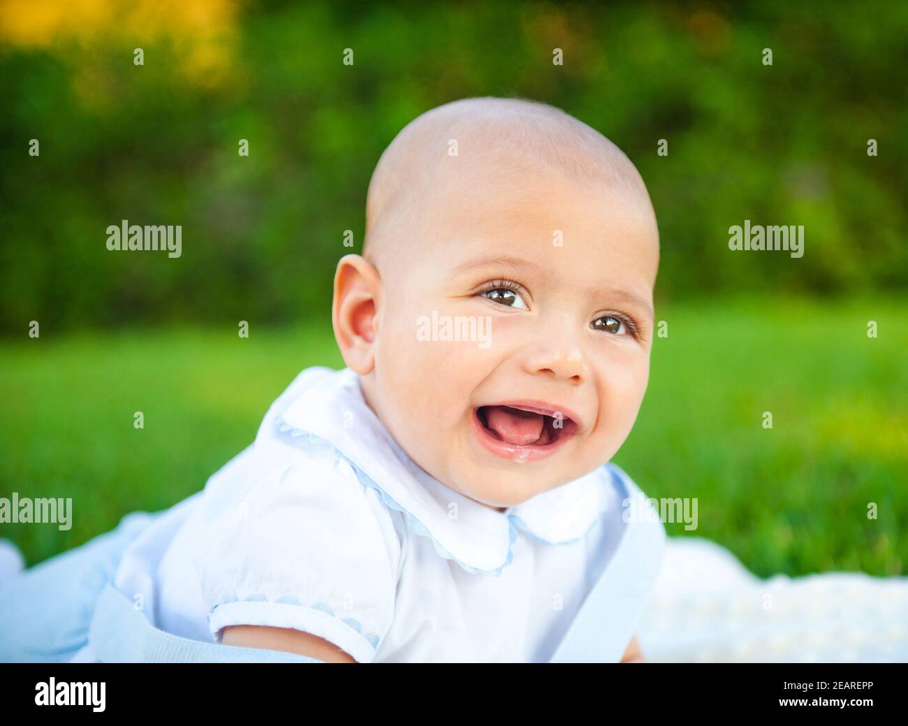Little cute boy, photo shoot on the street Stock Photo - Alamy