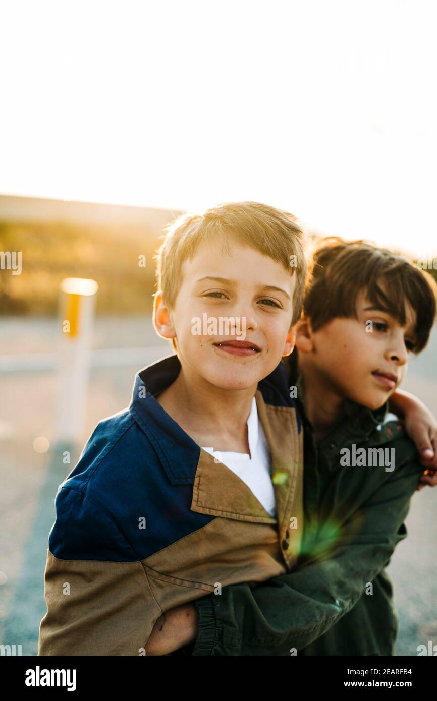 Teens hugging school hi-res stock photography and images - Alamy