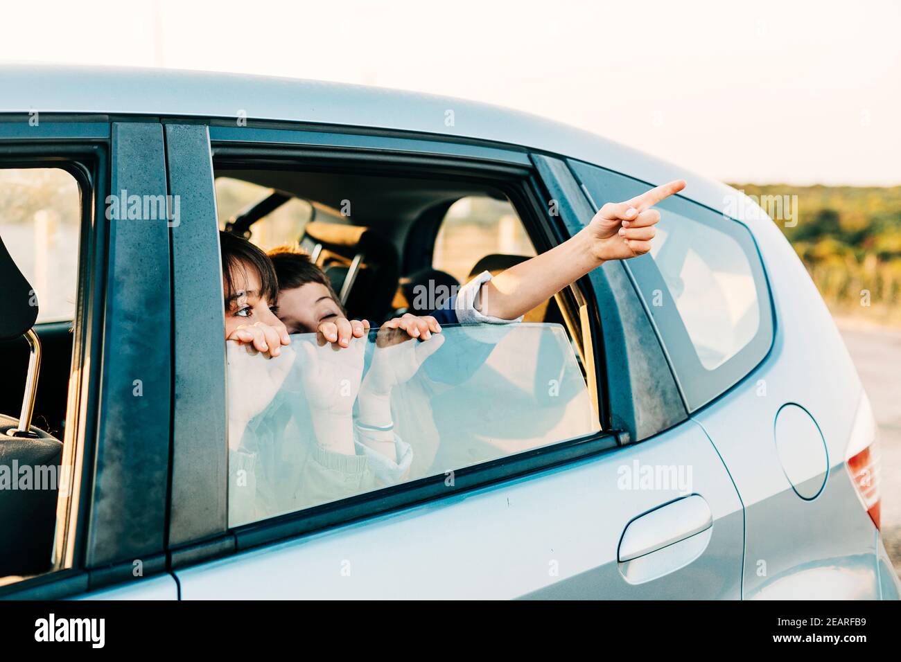 Boys with car hi-res stock photography and images - Alamy