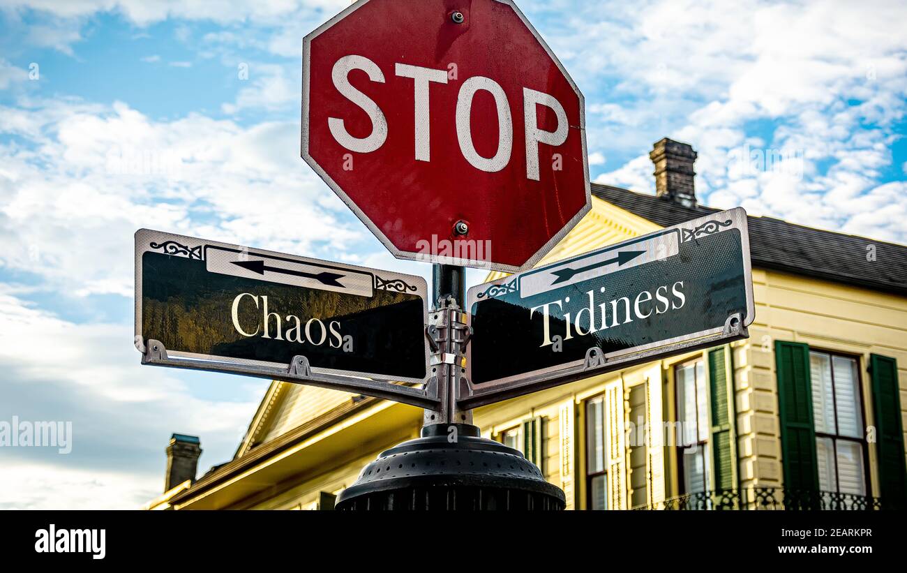 Street Sign the Direction Way to Tidiness versus Chaos Stock Photo - Alamy