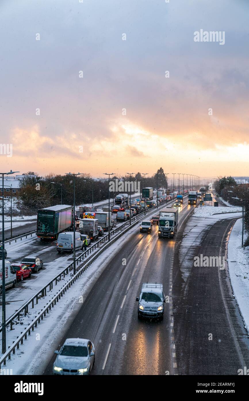 Traffic jam on two lanes after snow had fallen on a British dual ...
