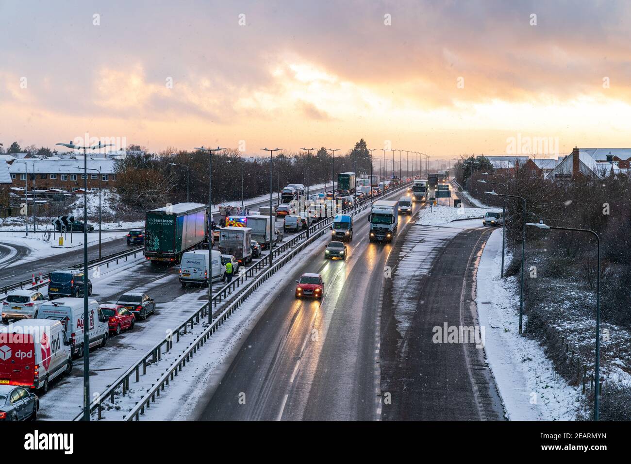 Traffic jam on two lanes after snow had fallen on a British dual ...