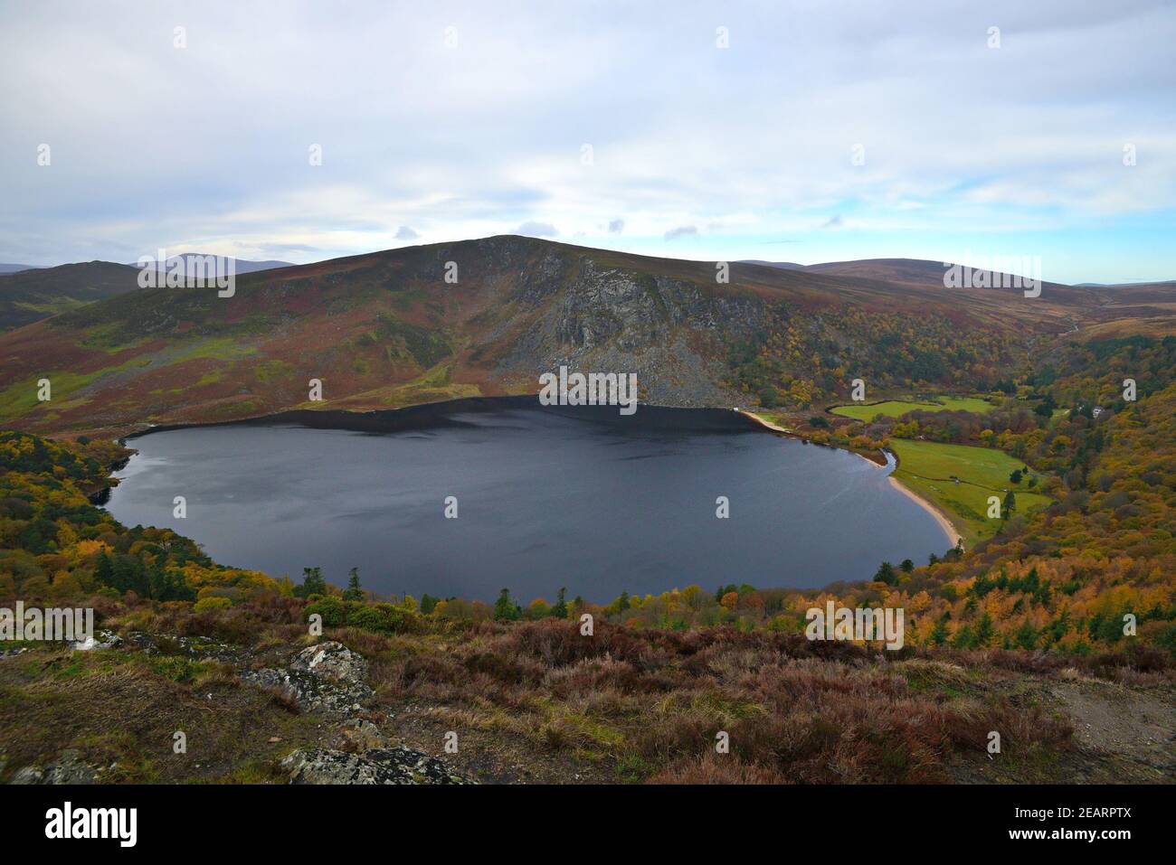 Landscape with panoramic view of Guinness Lake (Lough Tay) and the ...
