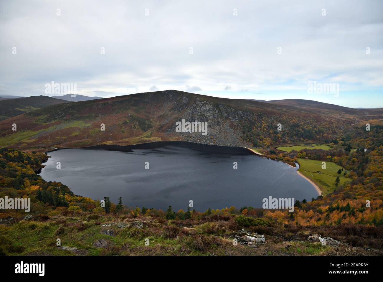 Landscape with panoramic view of Guinness Lake (Lough Tay) and the ...