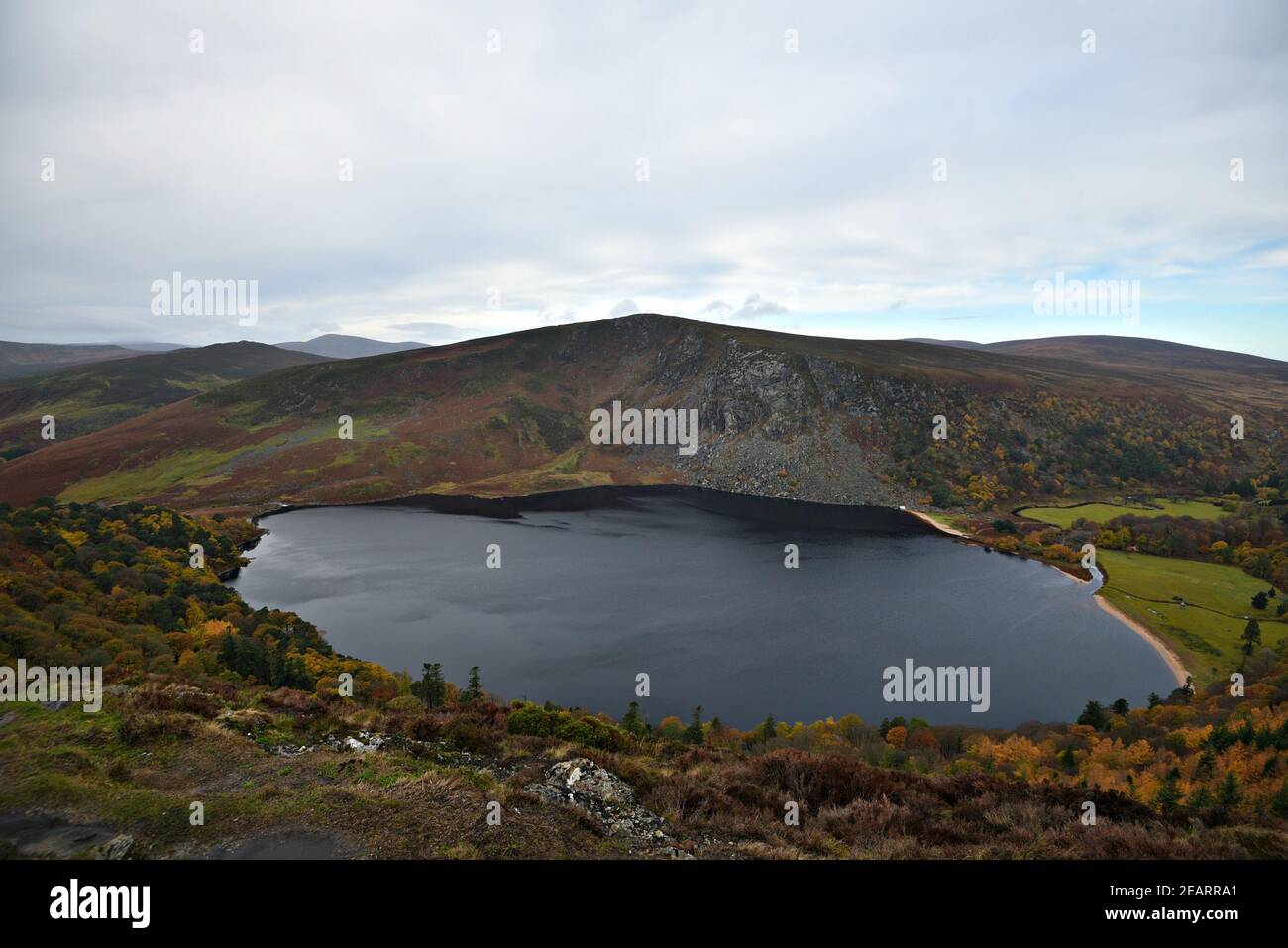 Landscape with panoramic view of Guinness Lake (Lough Tay) and the ...