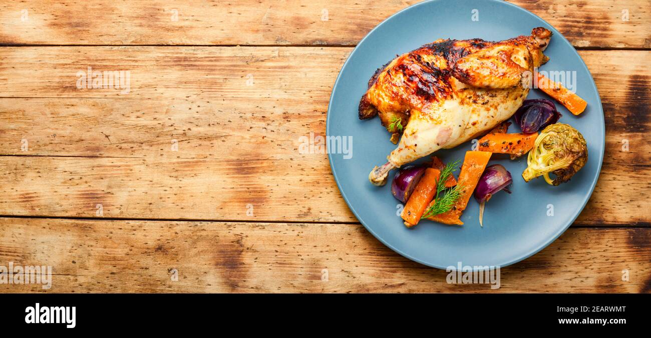Roasted partridge with pumpkin Stock Photo - Alamy
