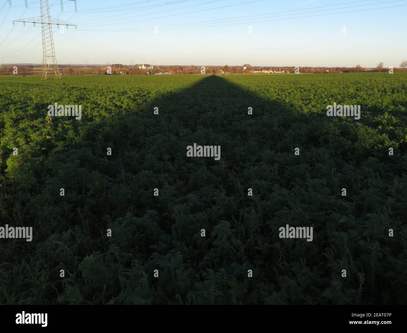 Long shadow of a wind turbine Stock Photo - Alamy