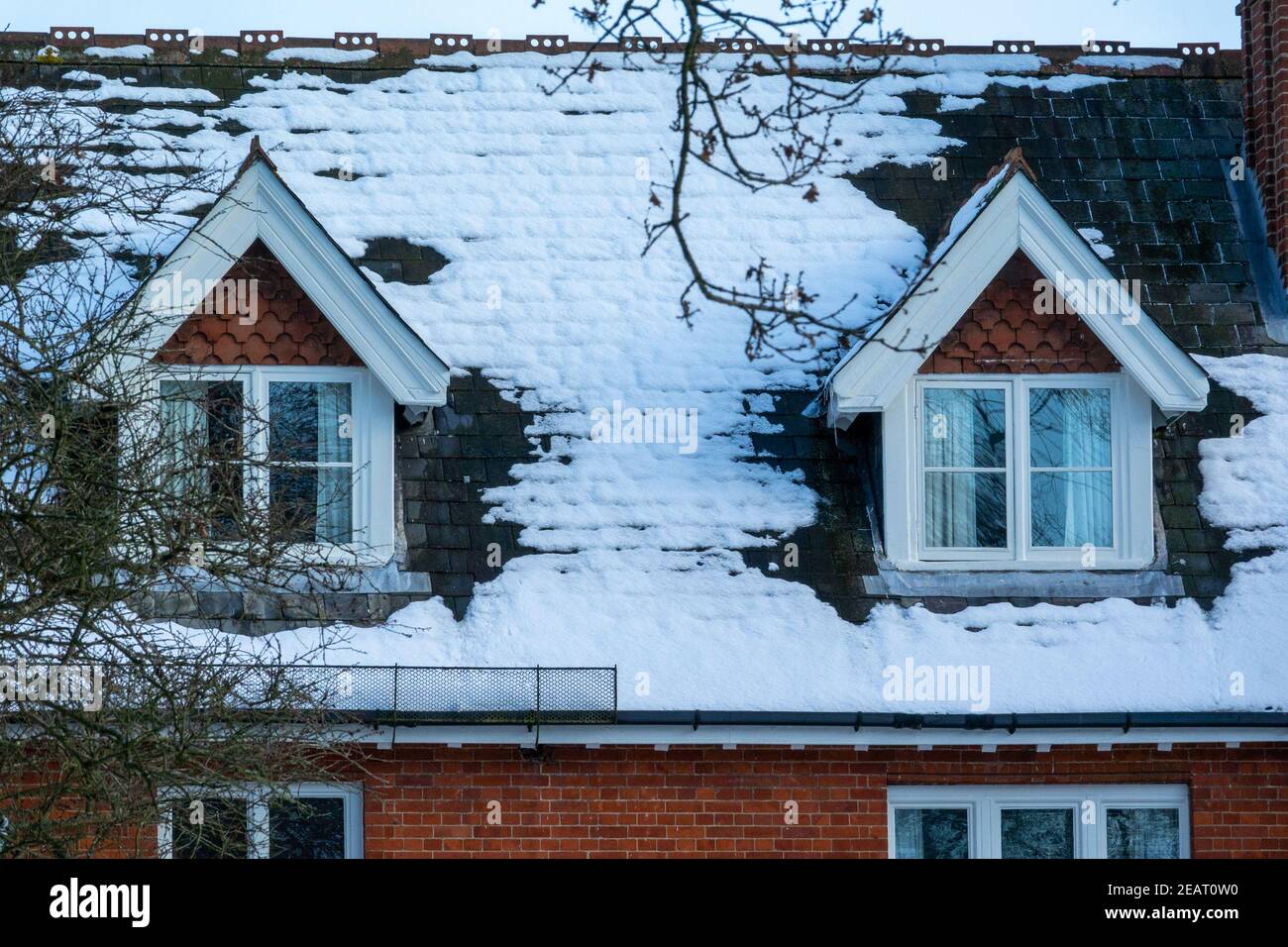 Dormer windows old house snow Stock Photo - Alamy