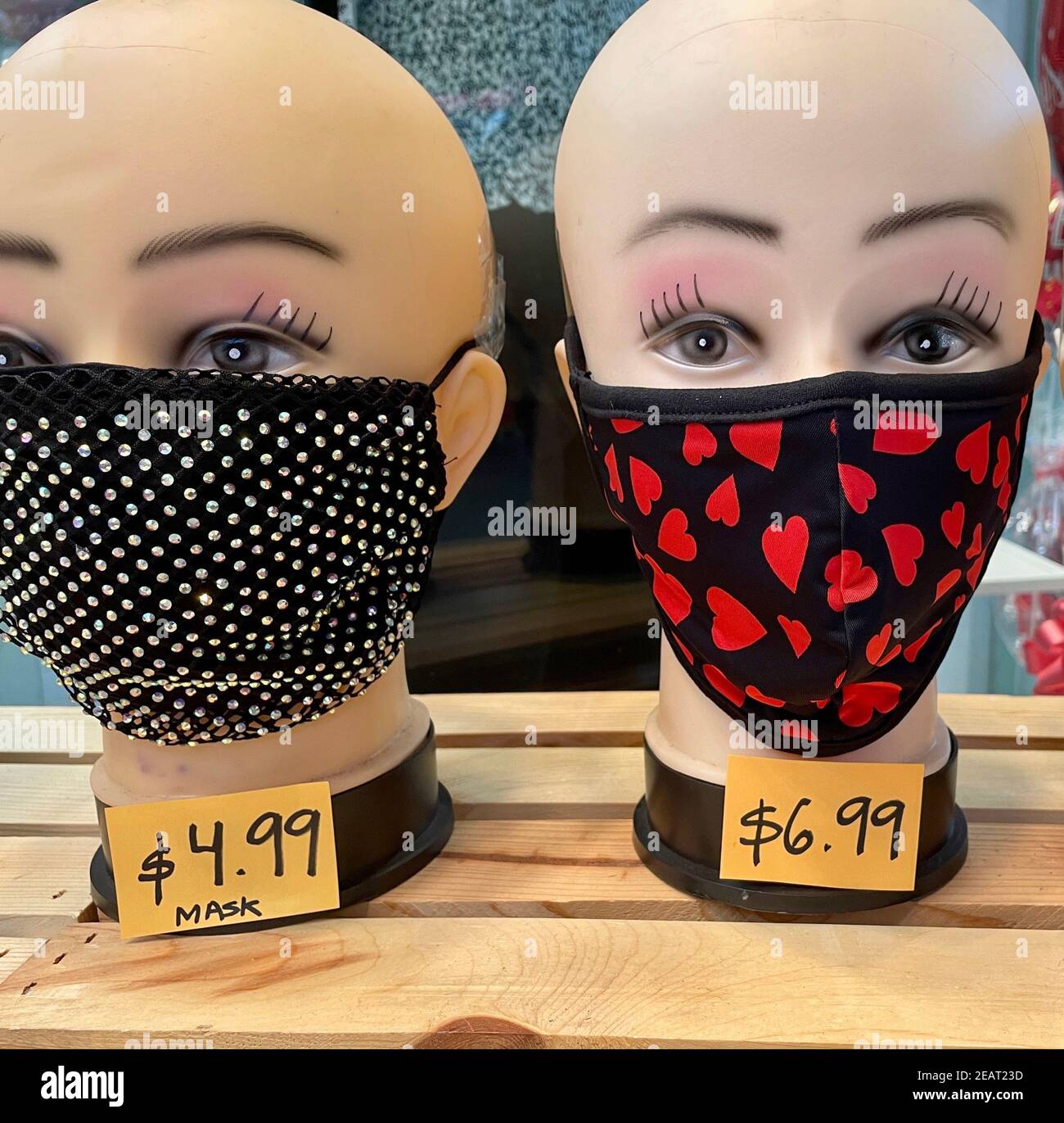 Female heads of Mannequins wearing face masks During COVID Stock Photo ...