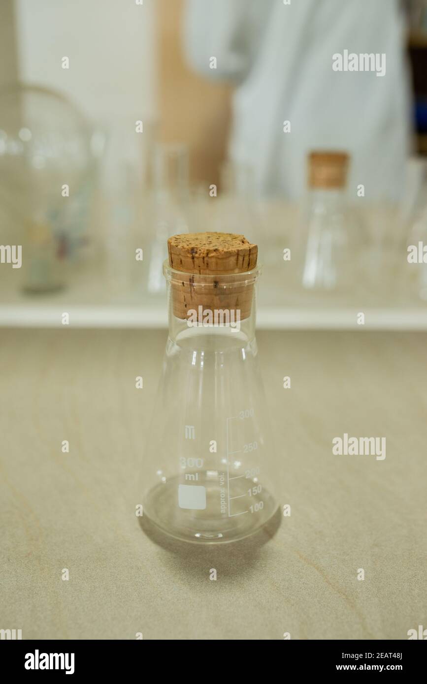 Laboratory test tube on a creamy surface Stock Photo - Alamy