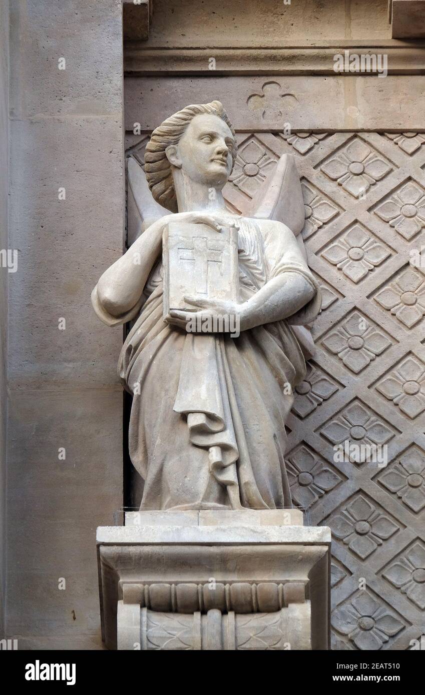 Angel, symbol of Saint Matthew the evangelist, statue on the facade of ...