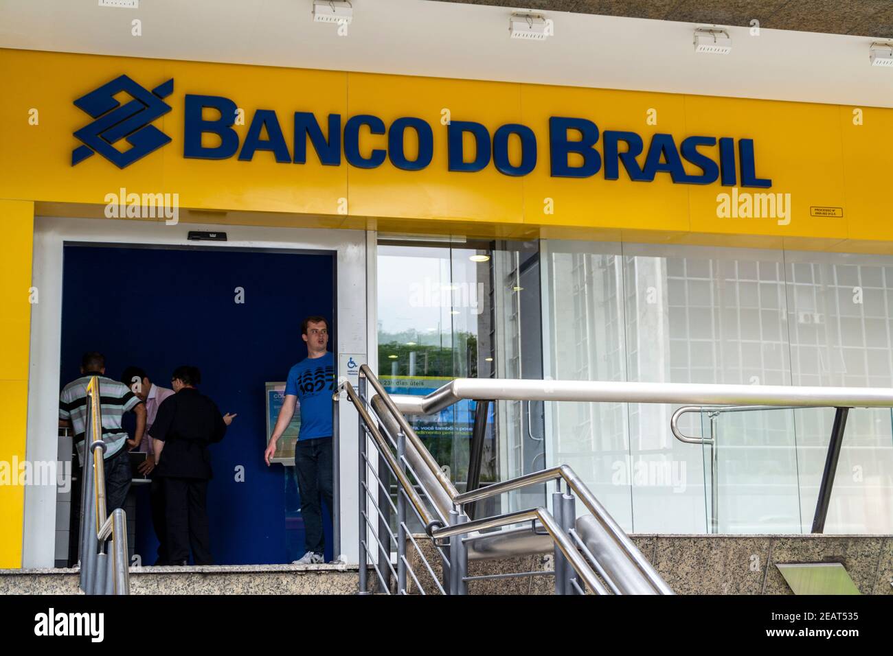 Customers inside one of the many secure ATM machine rooms with ...