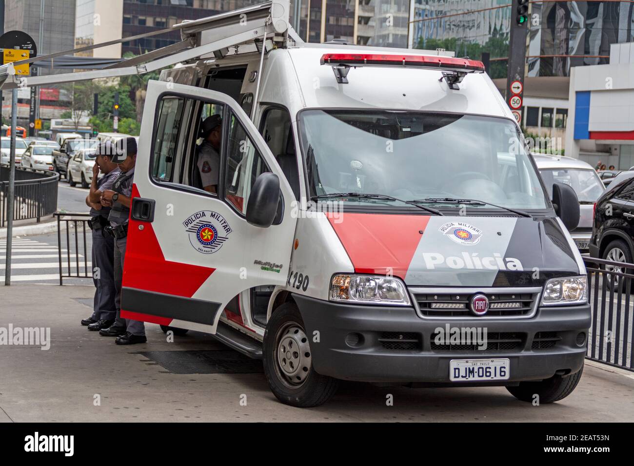 A Police van parked on the street pavement is used as a mobile police ...