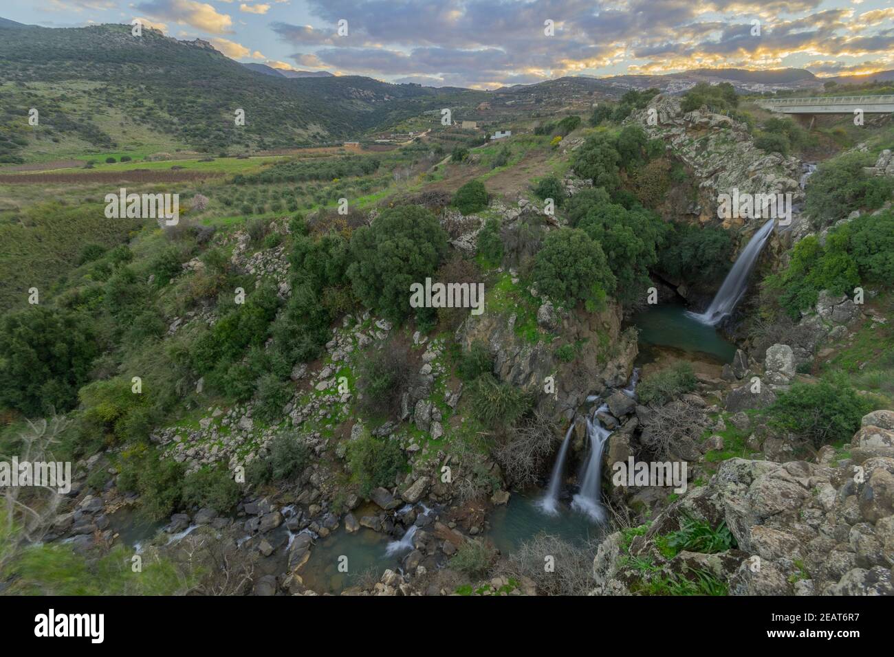 Sunrise view of the Saar waterfall, with the Nimrod fortress in the ...