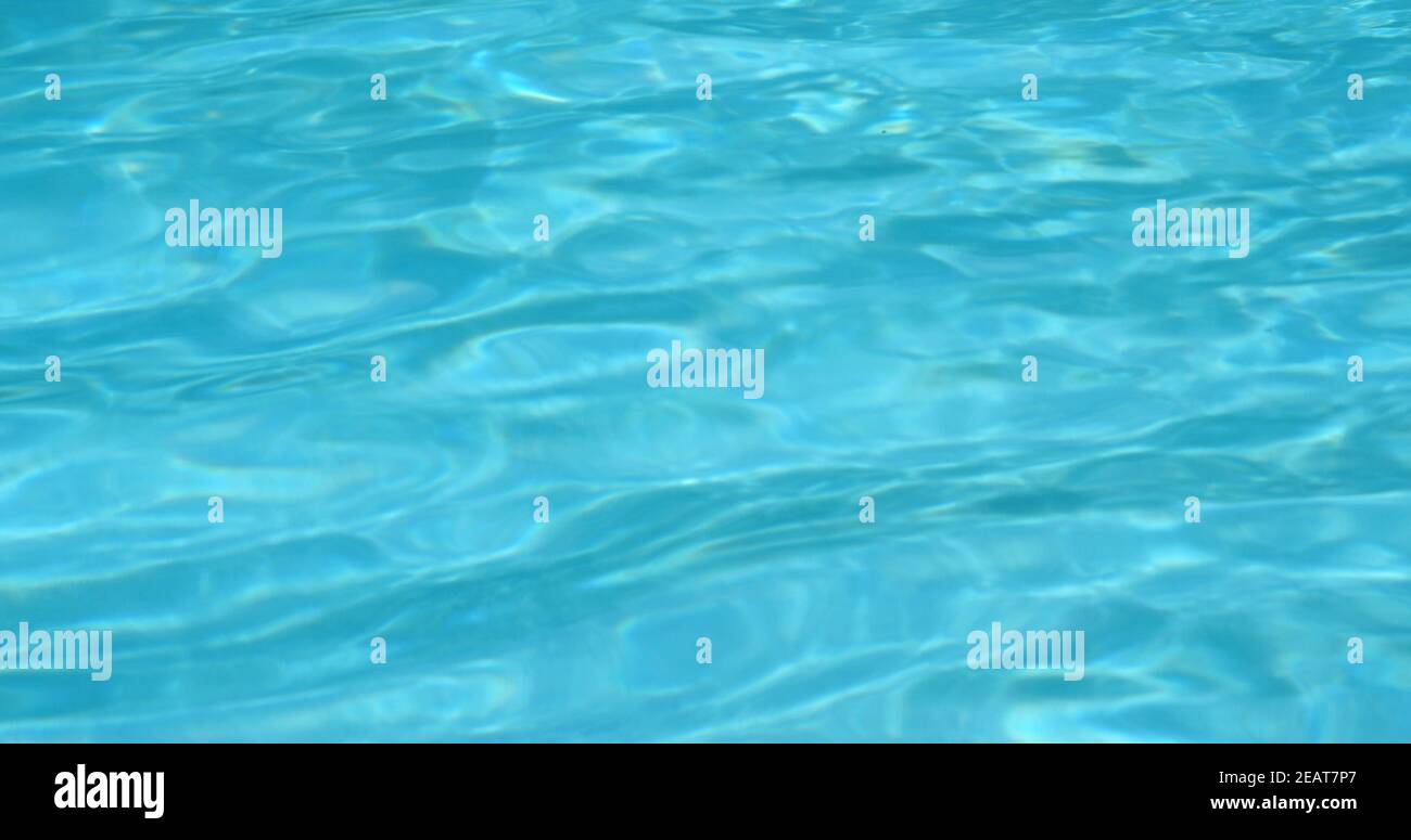 Swimming pool water wave in blue color Stock Photo - Alamy