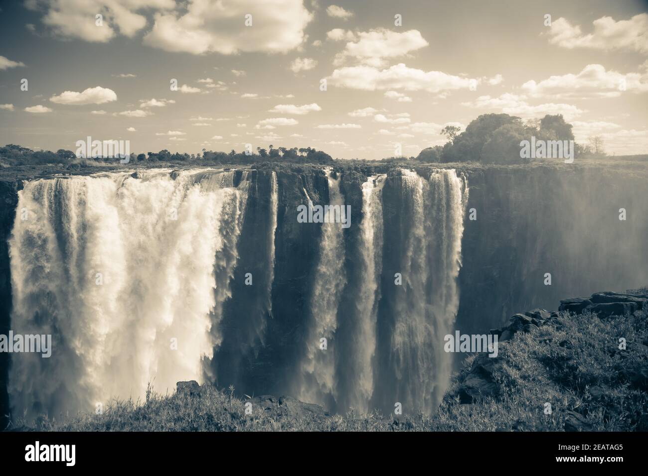Dramatic Victoria Falls with beautiful sky and mist Stock Photo - Alamy